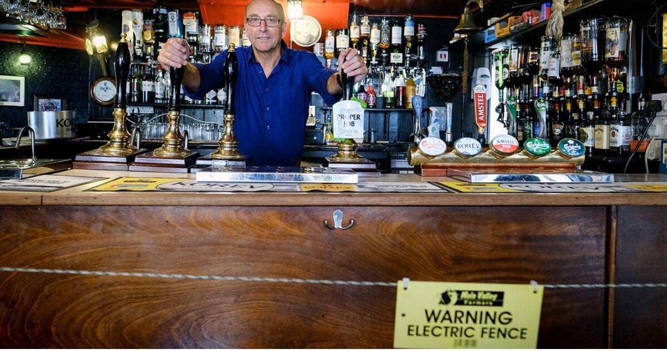 An Electric Fence For Social Distancing? This British Pub Says "Yes"