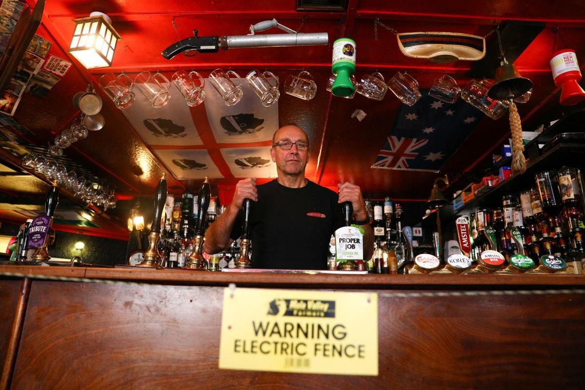 An Electric Fence For Social Distancing? This British Pub Says "Yes"