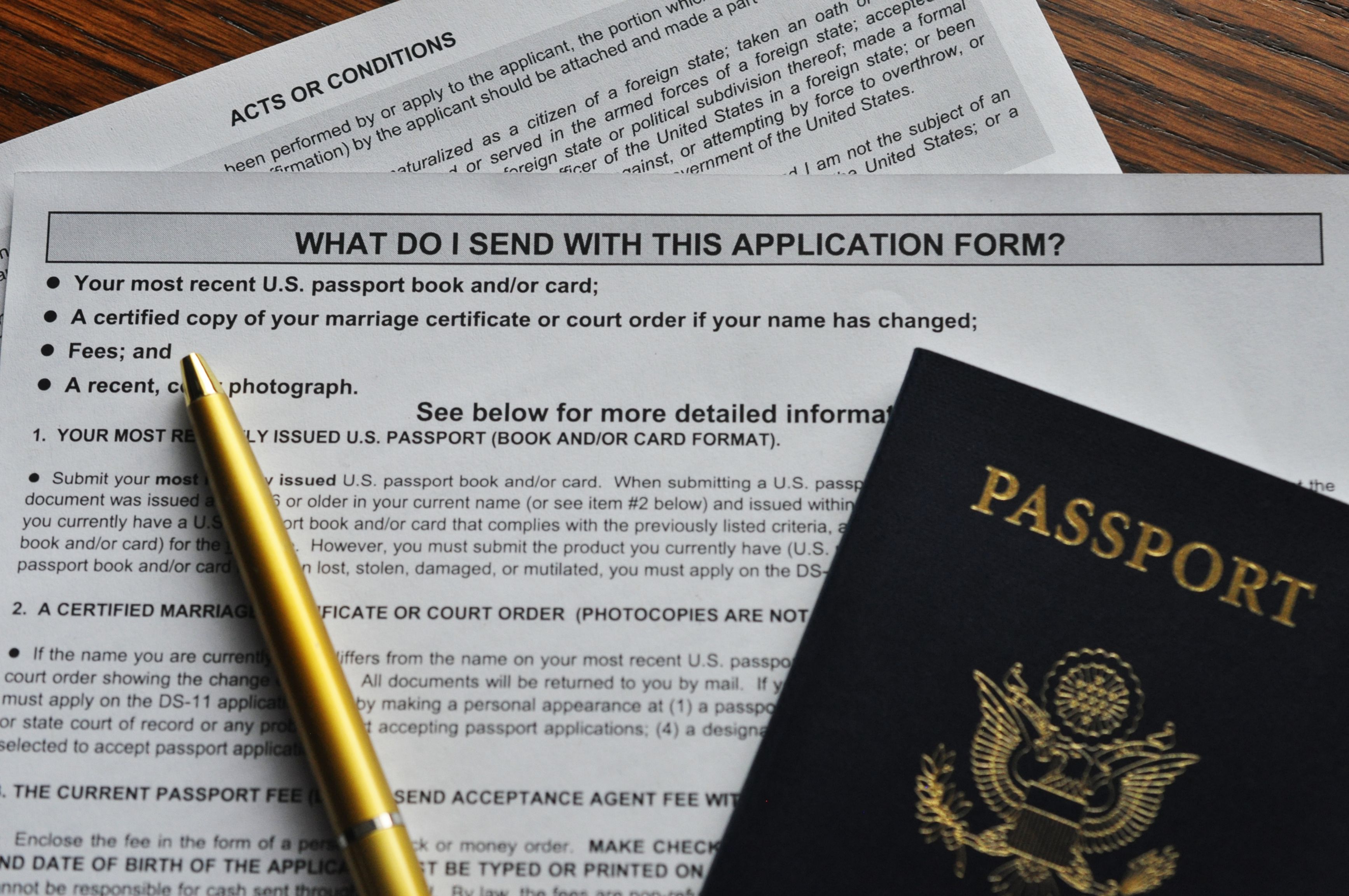 How Much You'll Pay For A Passport Renewal Fee (& Everything Else)